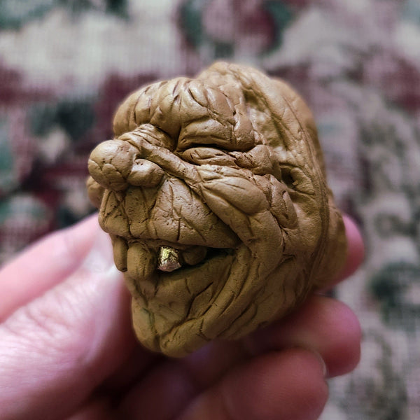 Kirk Roda - 'Walnut Shelf' - walnut shell, epoxy clay and gold leaf ...